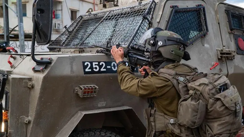 IDF soldier: There's a child behind the gunman, I'm not shooting ...