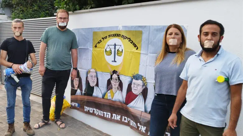 Tape-face protest outside Supreme Court justice's house | Israel ...